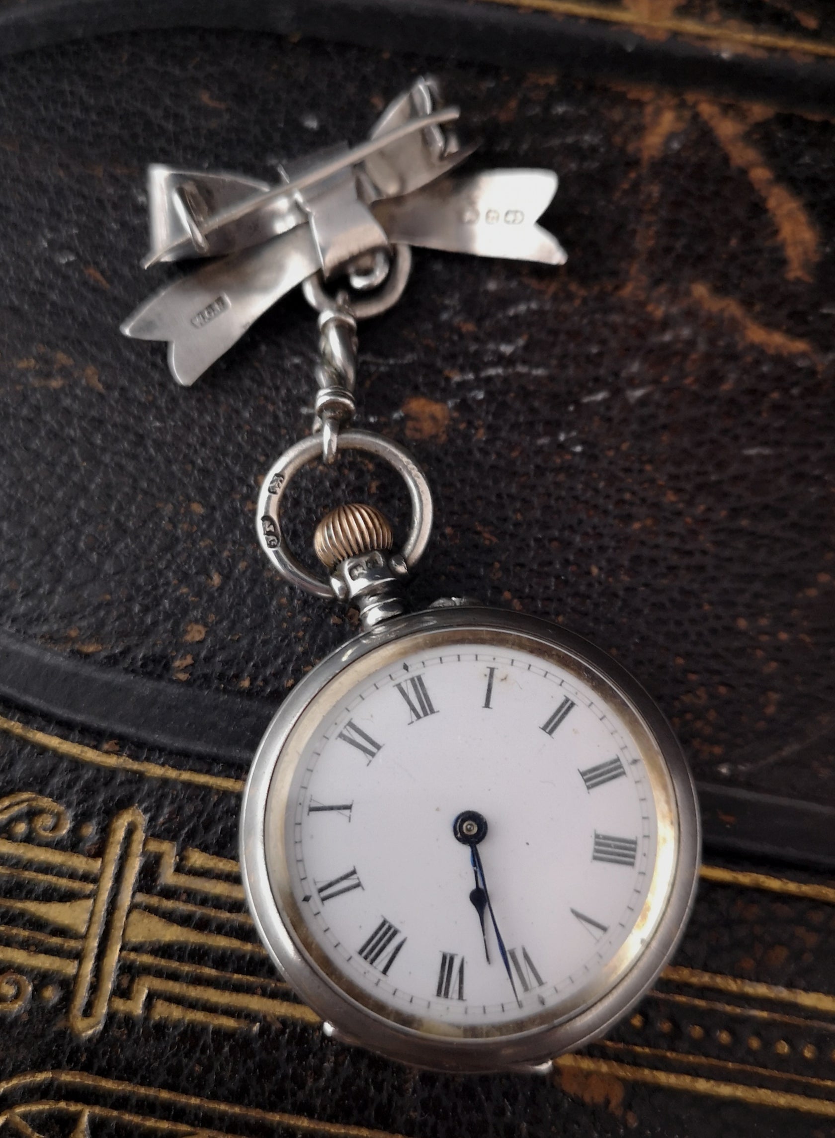 Victorian pocket watch, silver and enamel, bow brooch – StolenAttic